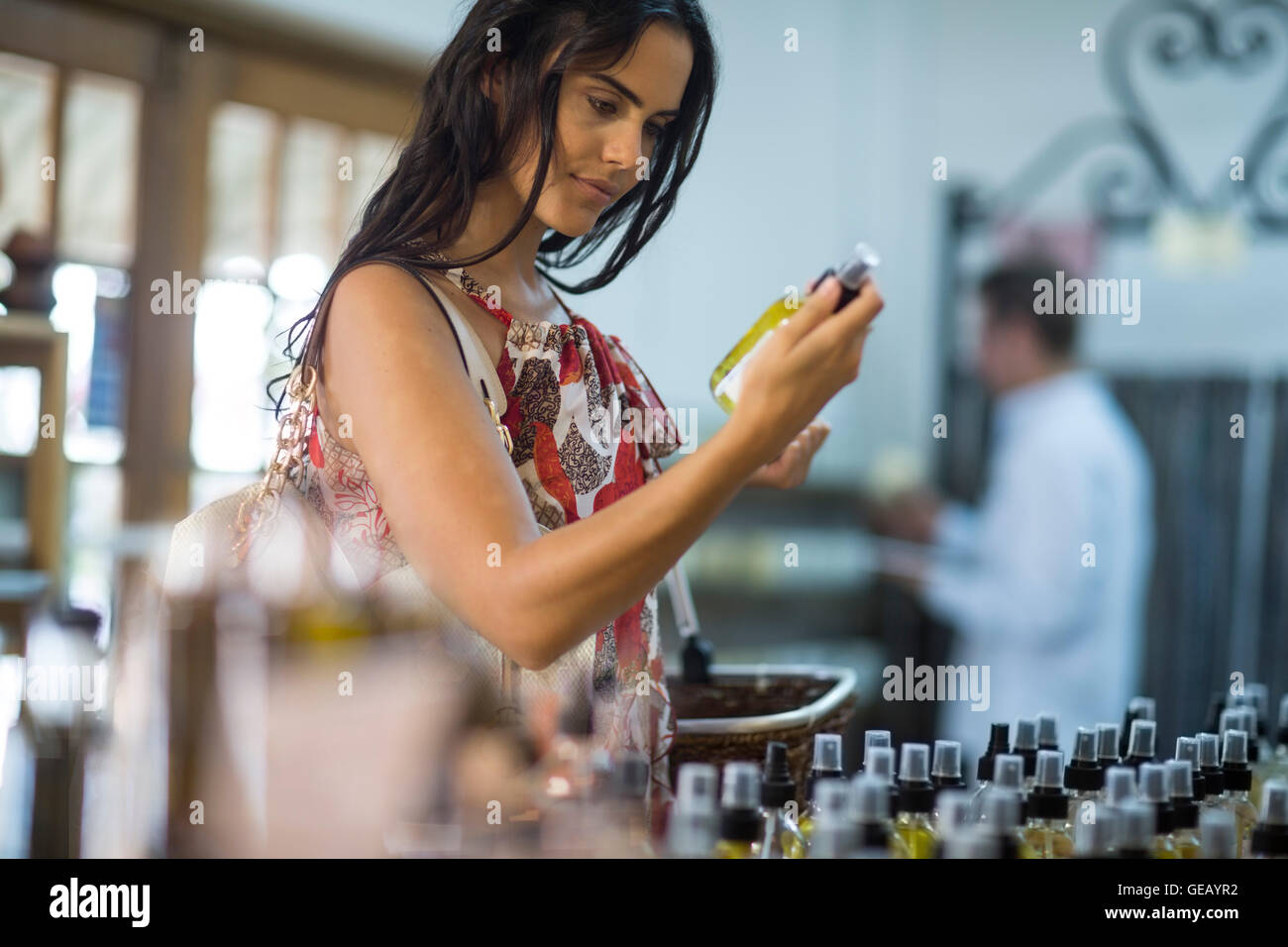 Holding perfume shop hi-res stock photography and images - Alamy