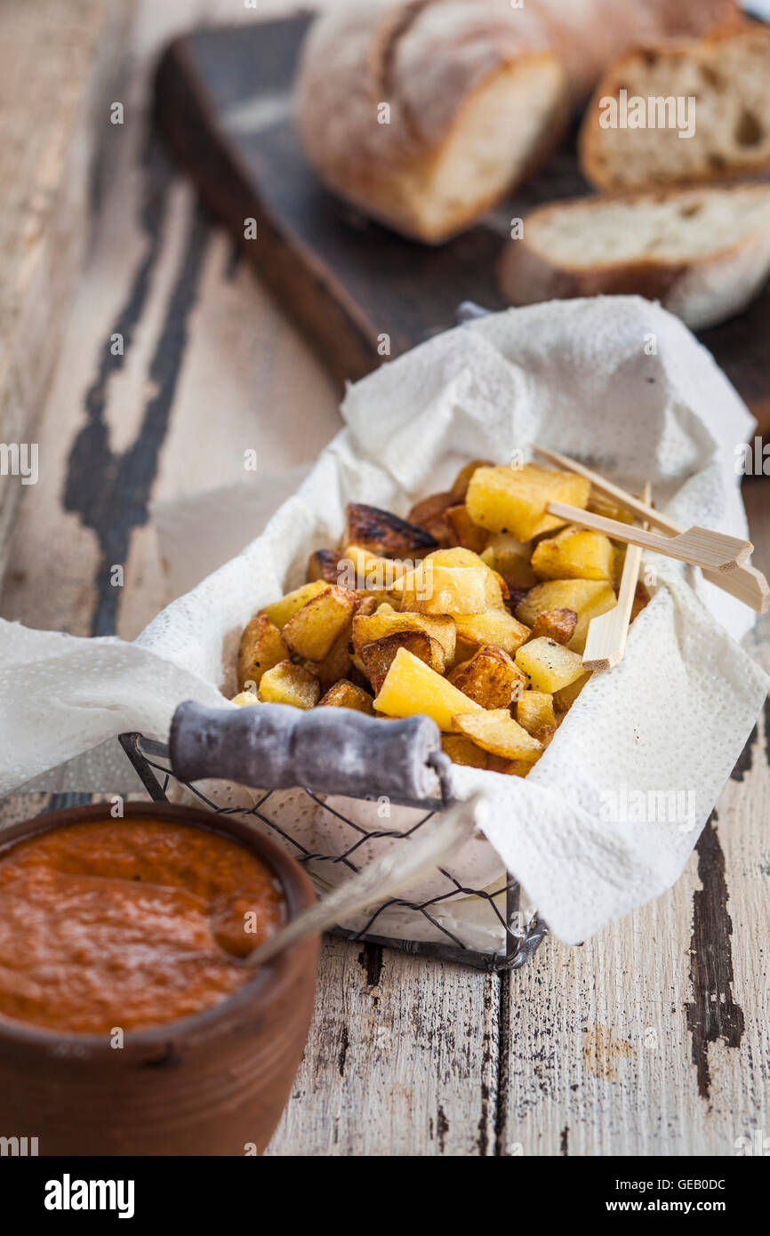Tapas, patatas bravas and mojo sauce, bread Stock Photo - Alamy