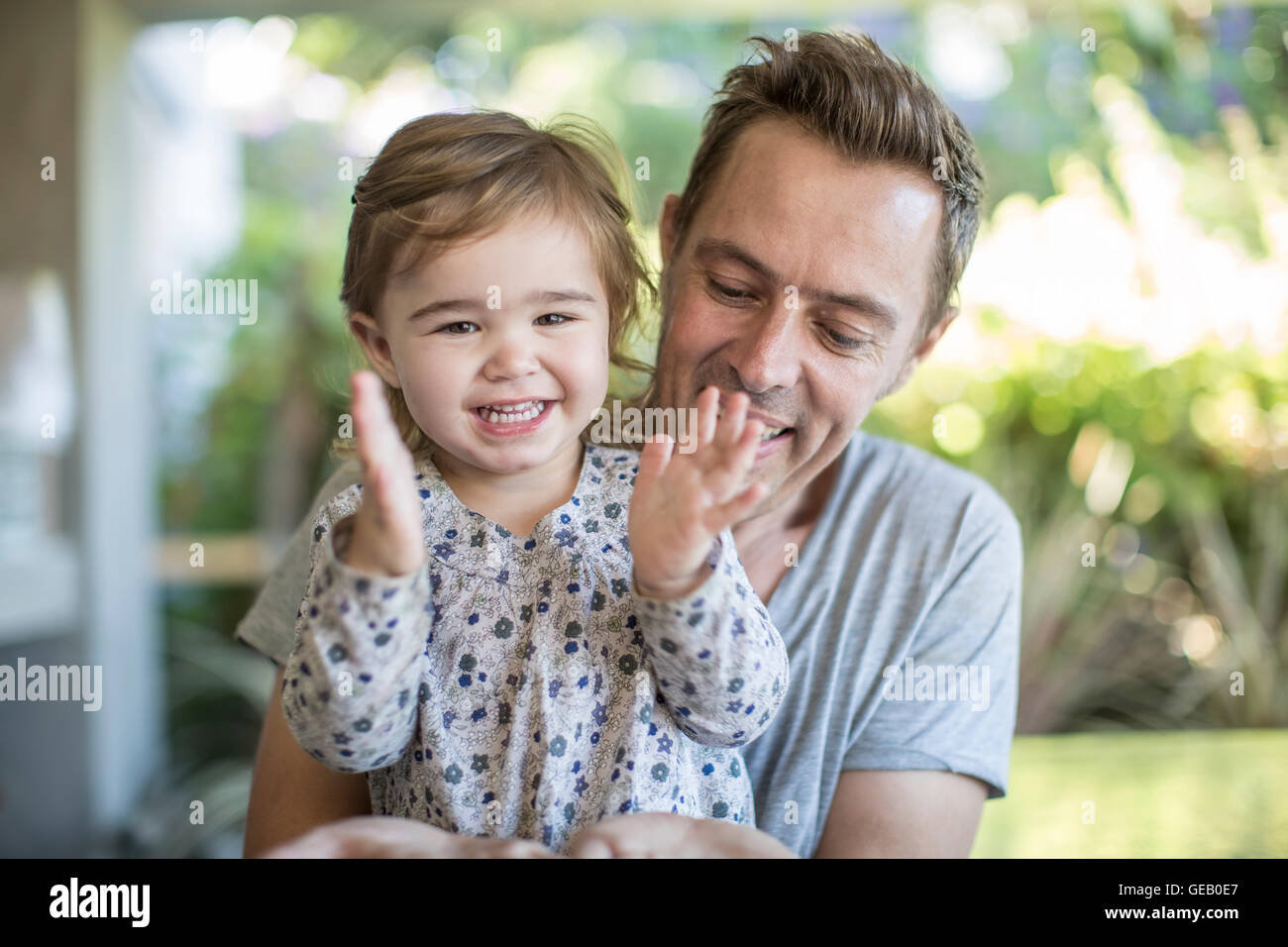 Cute baby clapping hands smiling hi-res stock photography and images ...