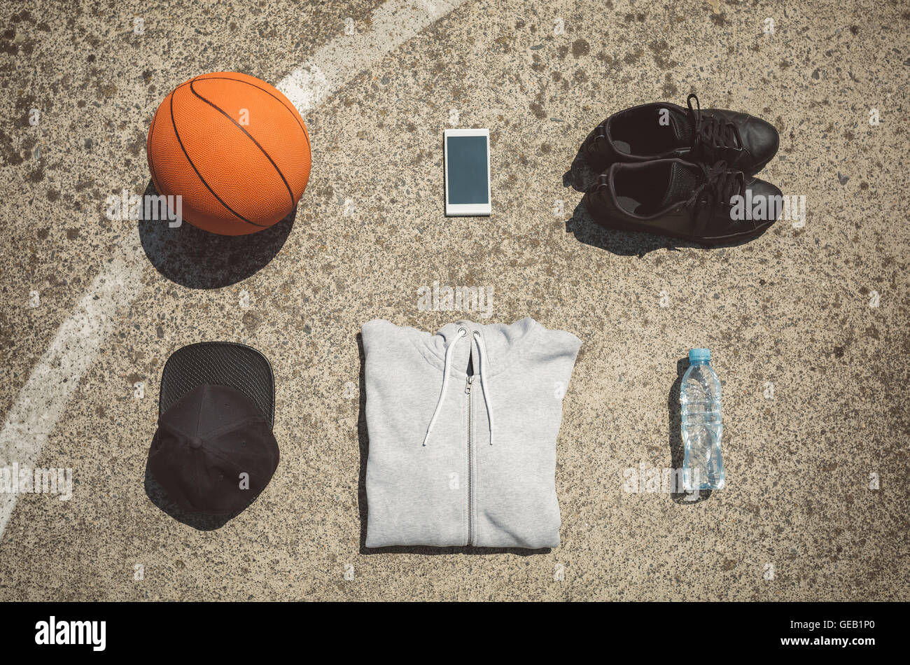 Basketball items lying on ground of basketball court Stock Photo - Alamy