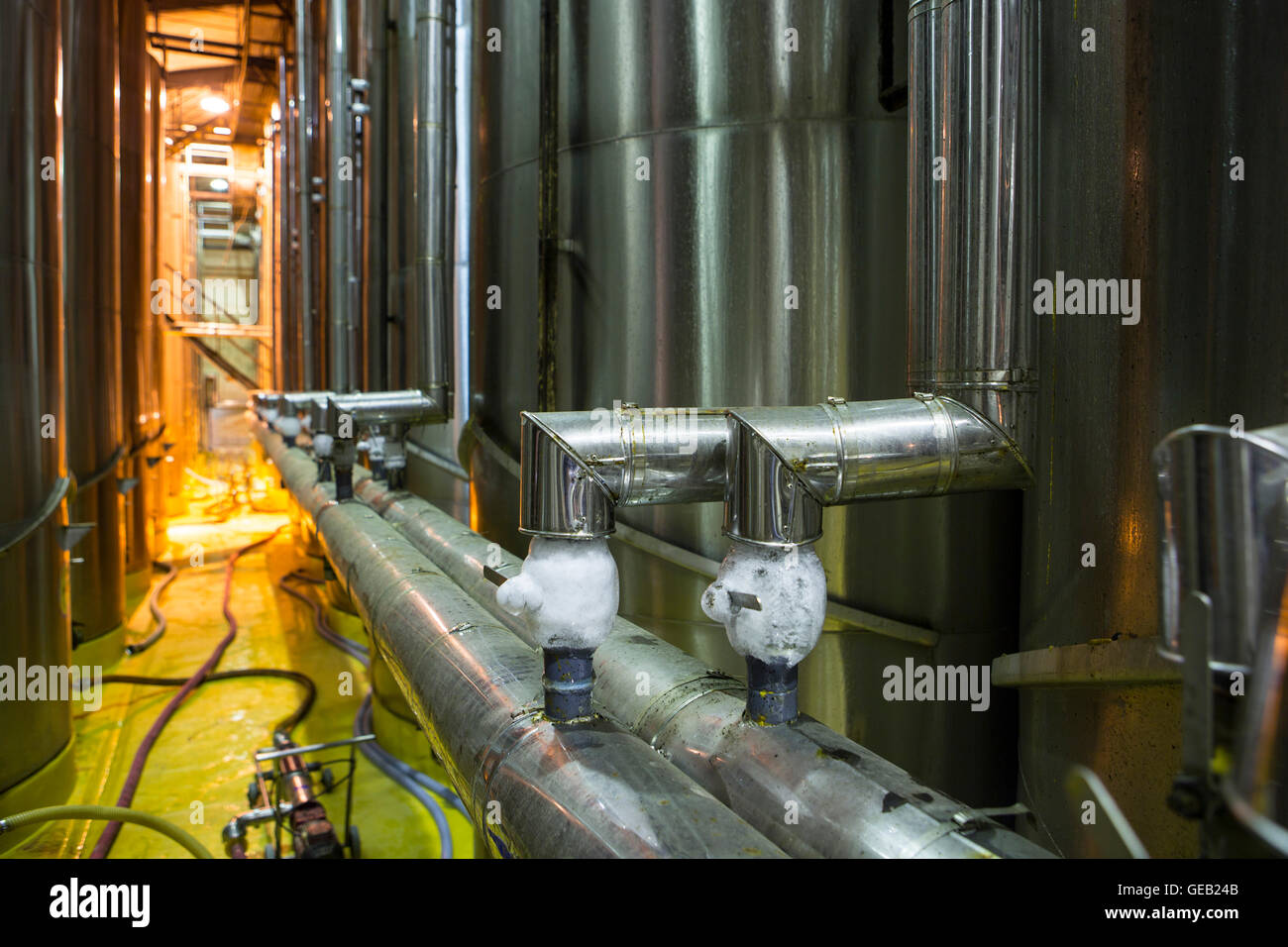 Pipework of of industrial steel tanks Stock Photo - Alamy