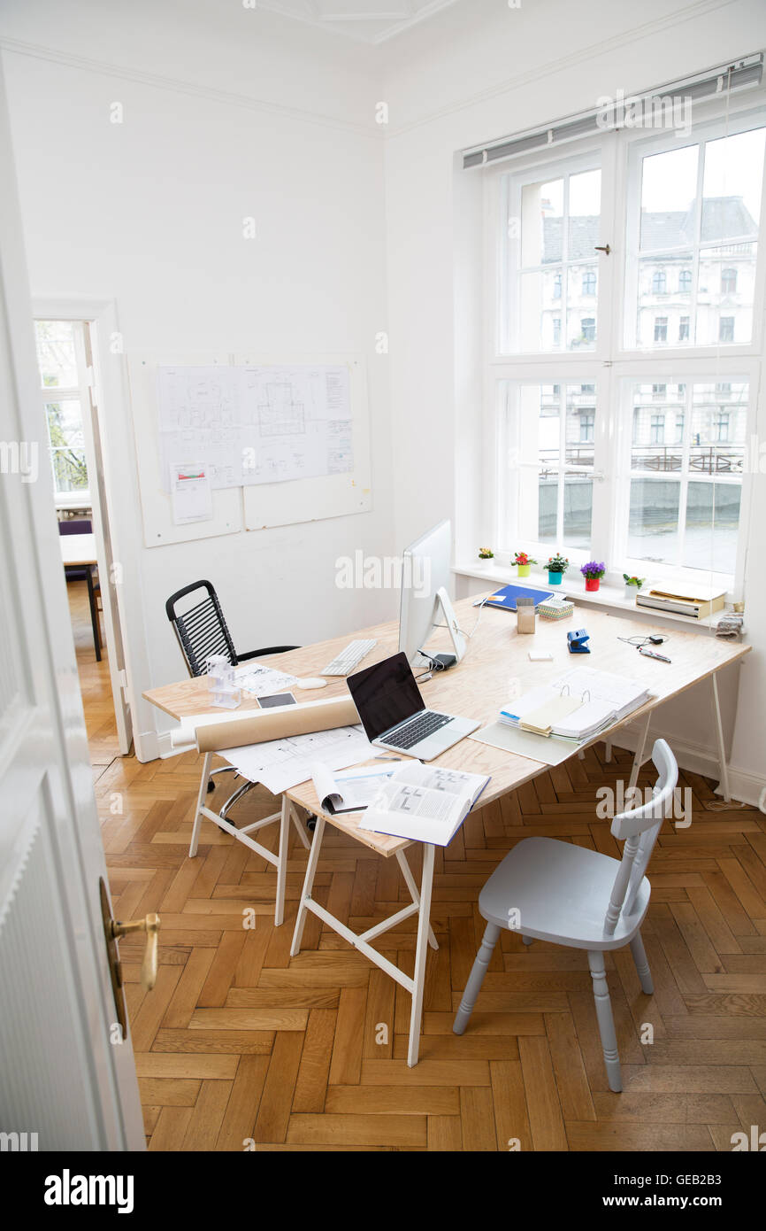 Workspace in empty office Stock Photo - Alamy