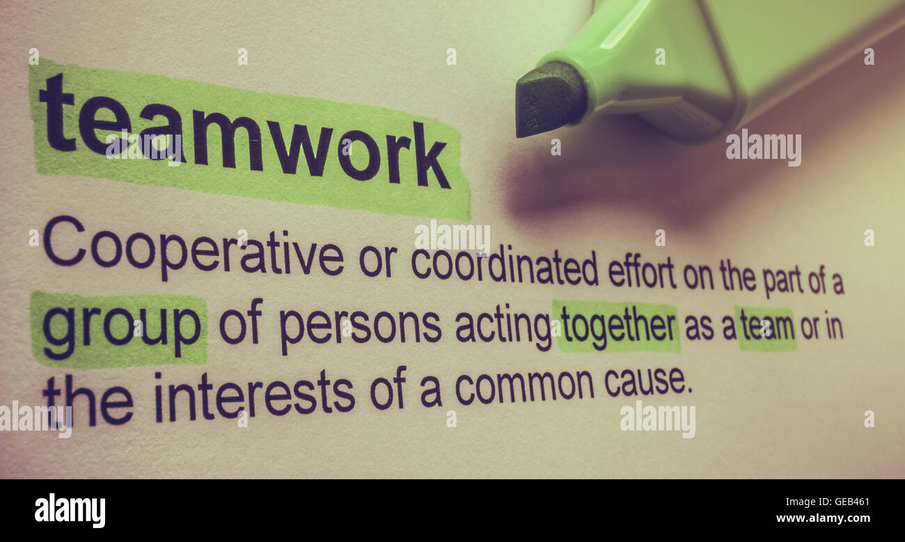 Definition of teamwork, highlighted in colour Stock Photo - Alamy