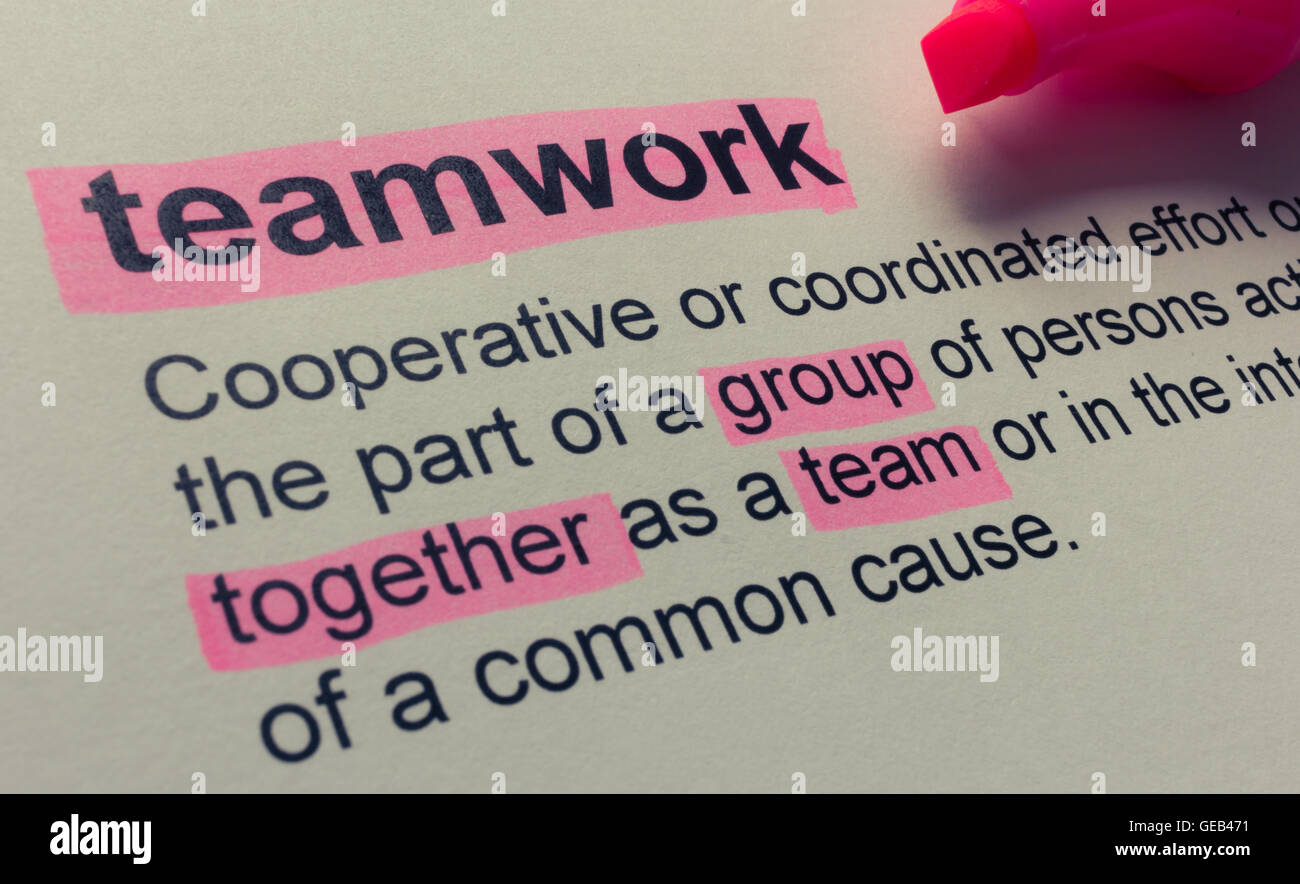 Definition of teamwork, highlighted in colour Stock Photo - Alamy