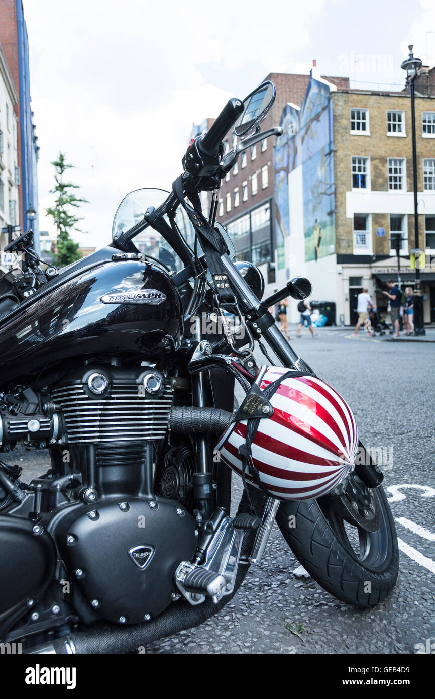 A Triumph motorbike parked near Carnaby Street in London, UK Stock ...