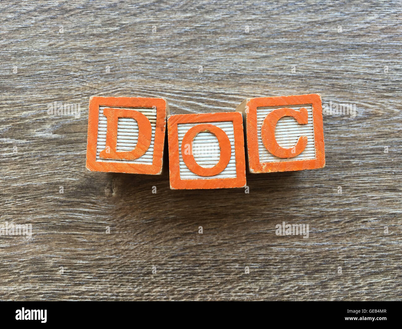 Alphabet wood block letters forming the word DOC , combining those toys ...