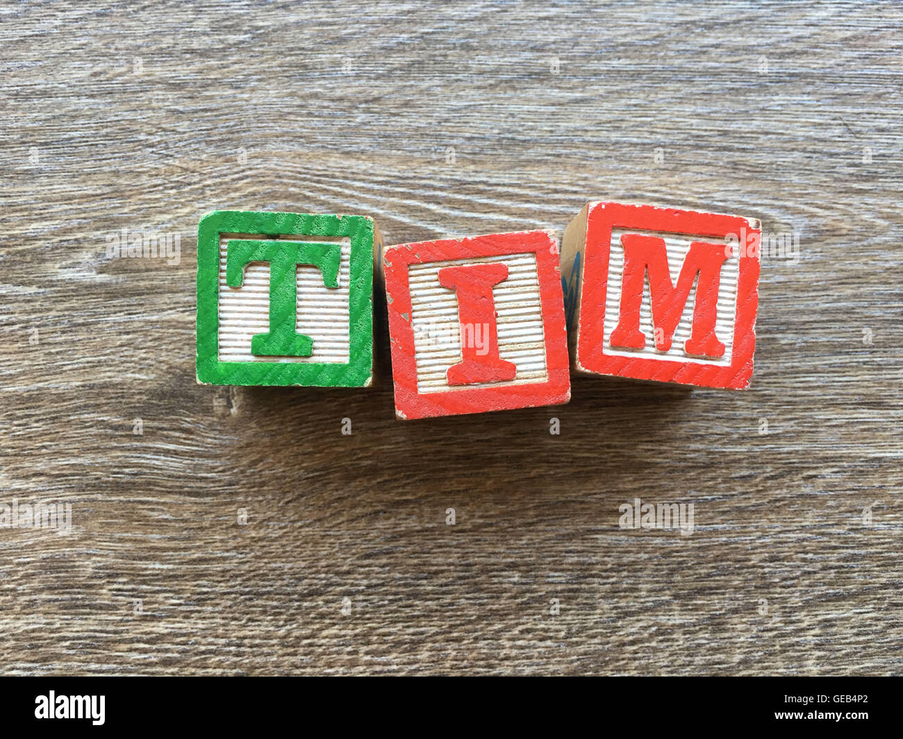 TIM name written with wood block characters Stock Photo - Alamy