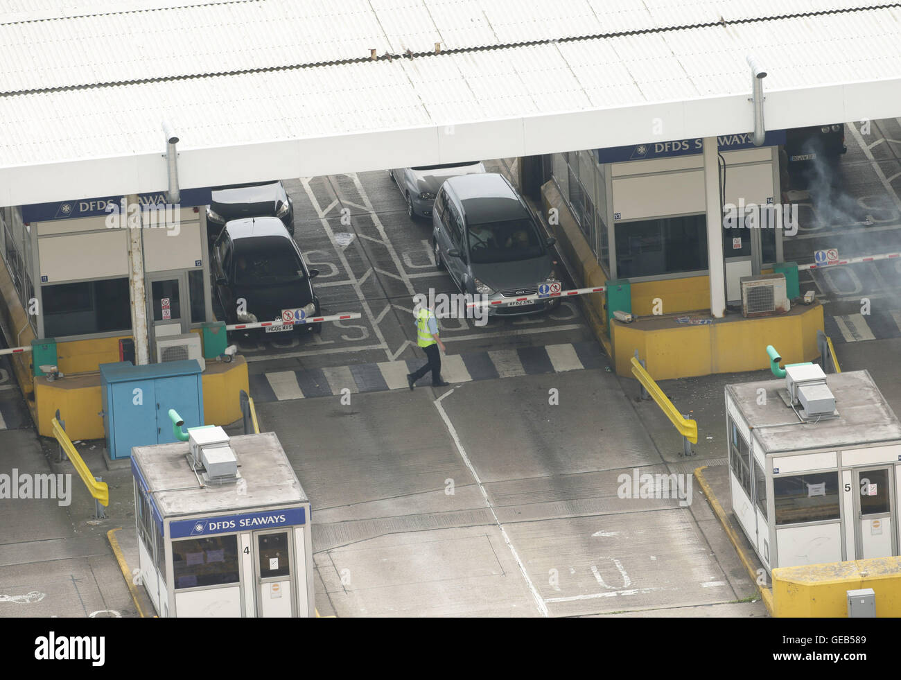 Vehicles stopped at Border Control booths at the Port of Dover in Kent ...