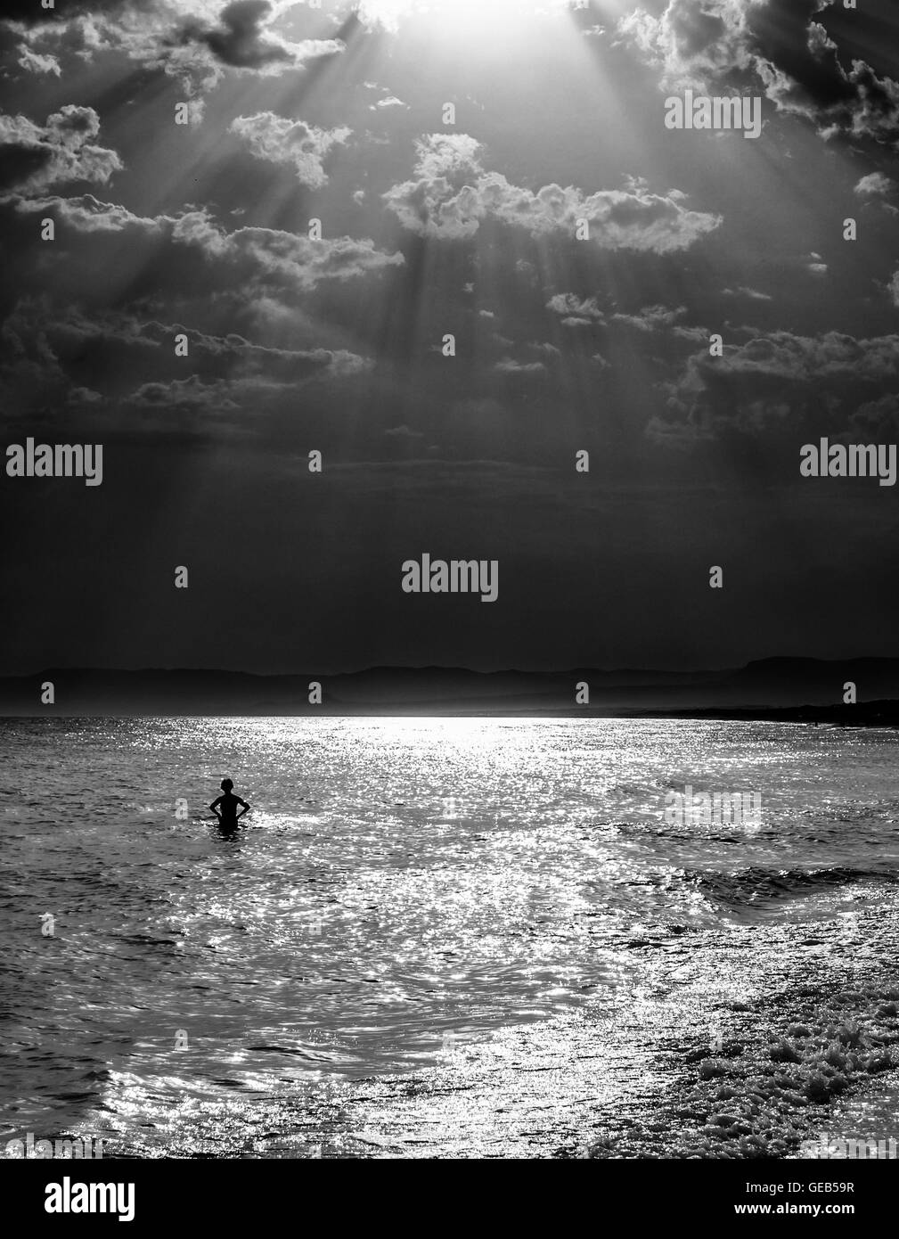 Young woman beach sunrise Black and White Stock Photos & Images - Alamy