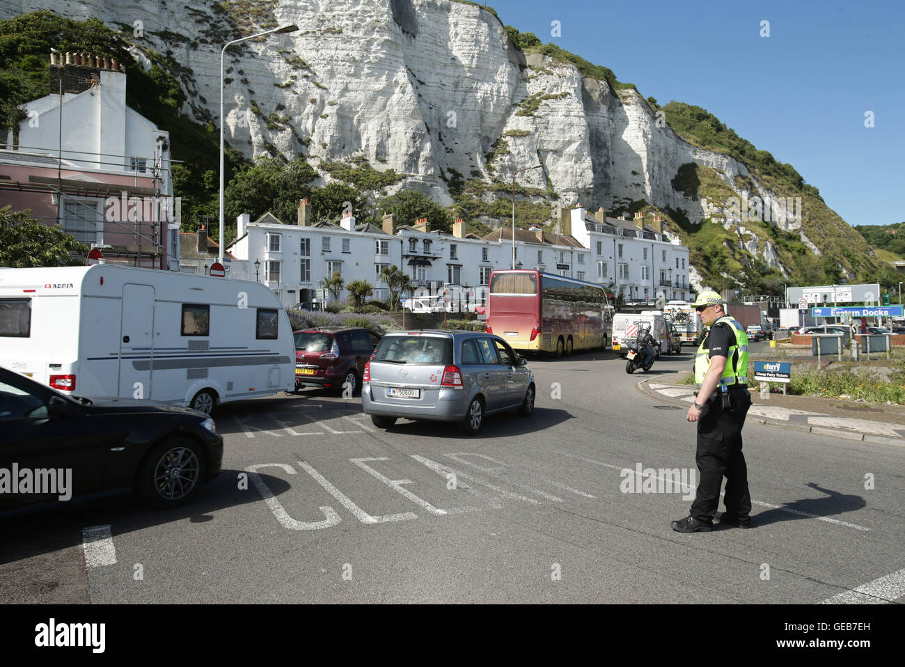 A police officer directing traffic on the A20 approach to the Port of ...