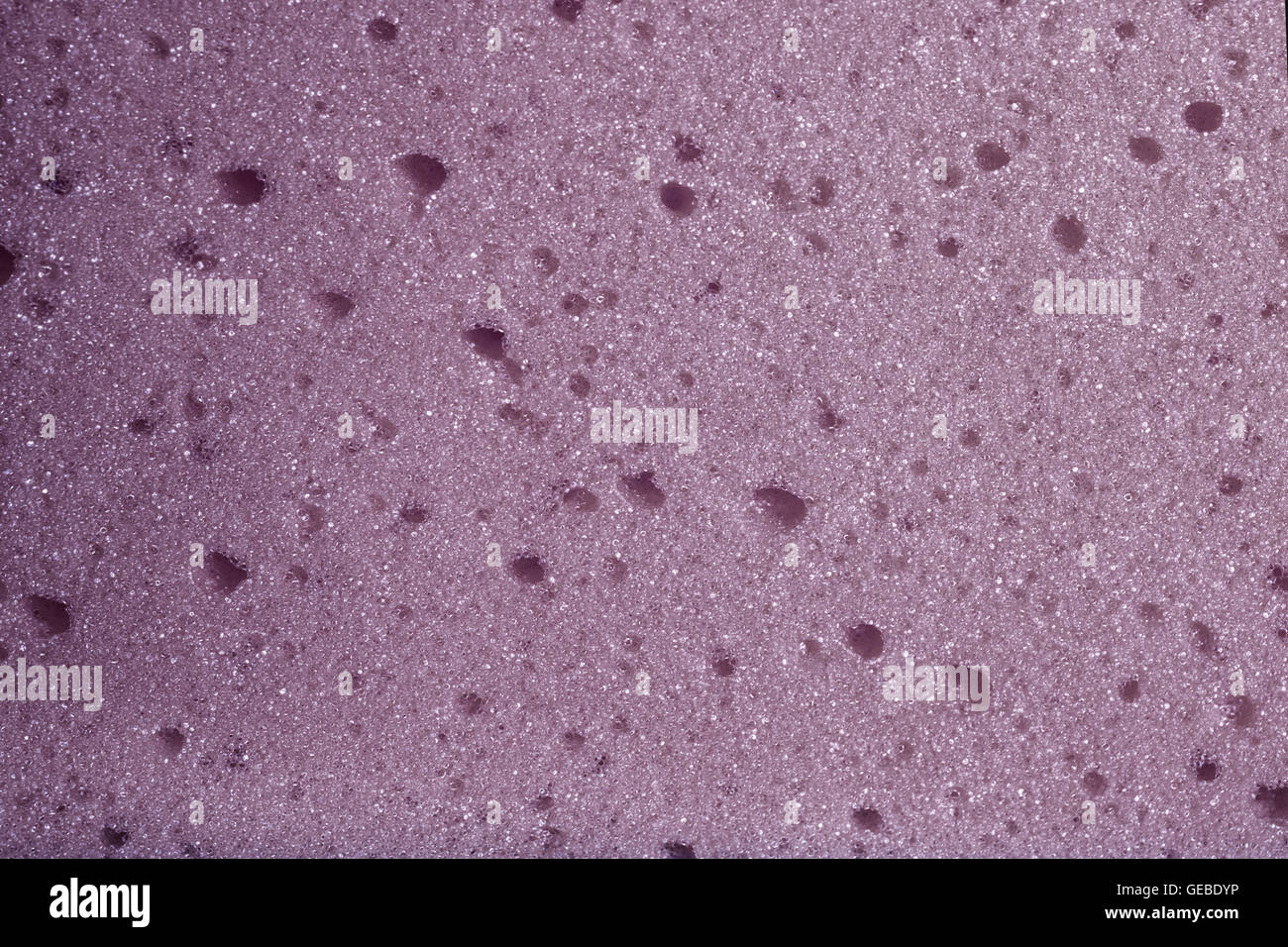 Texture of purple bath sponge macro Stock Photo - Alamy