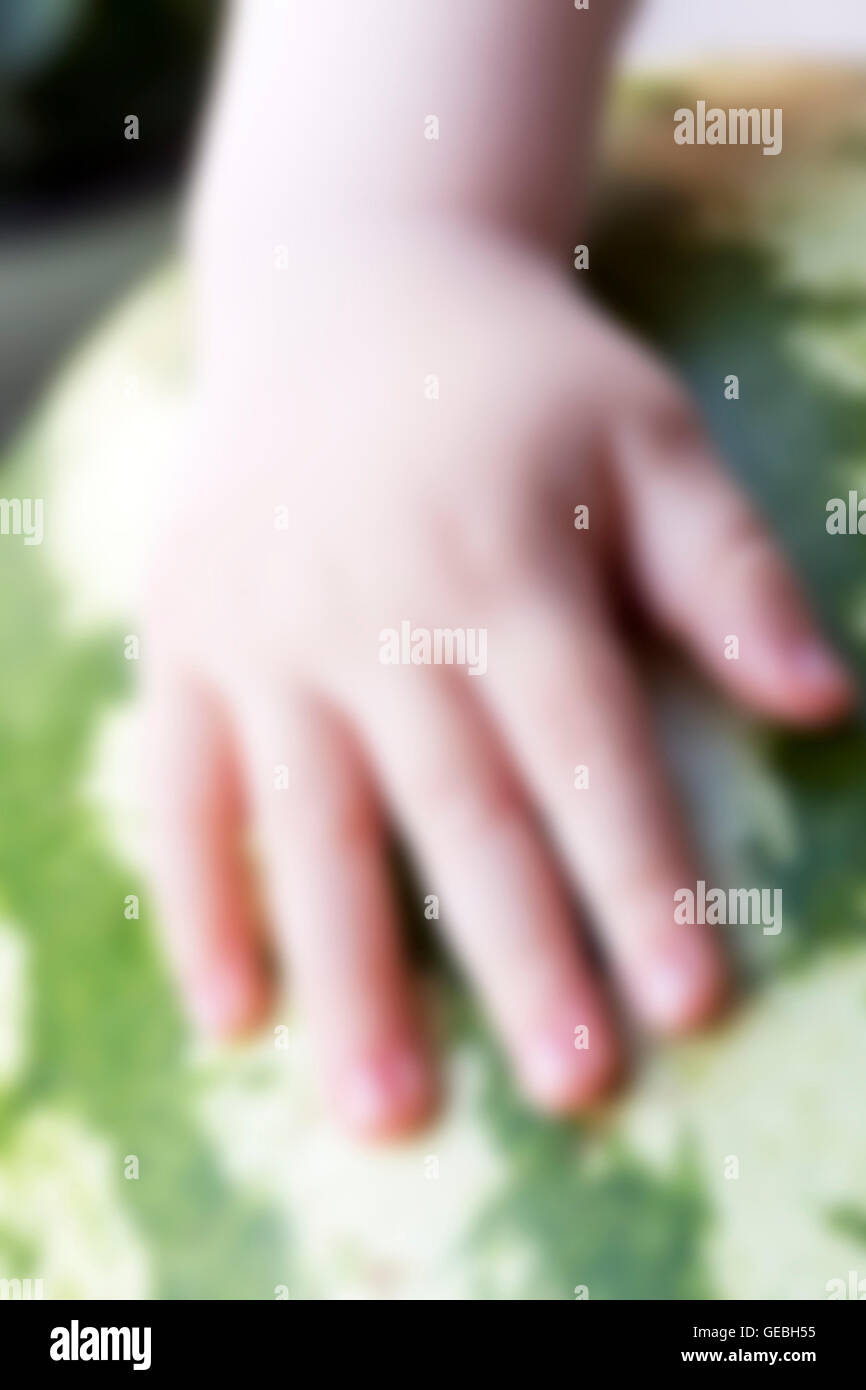 hand on watermelon Stock Photo - Alamy