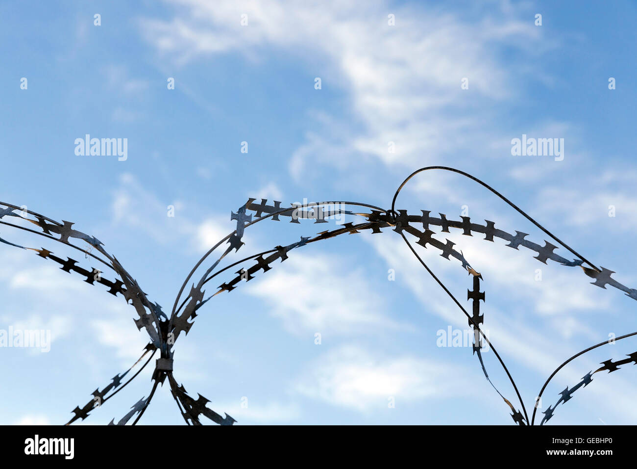 barbed wire, sky Stock Photo - Alamy