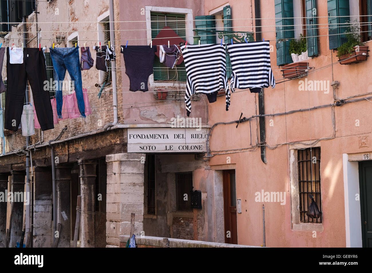 Gondoliere shirts and laundry hanging on a clothes line Venice Italy ...