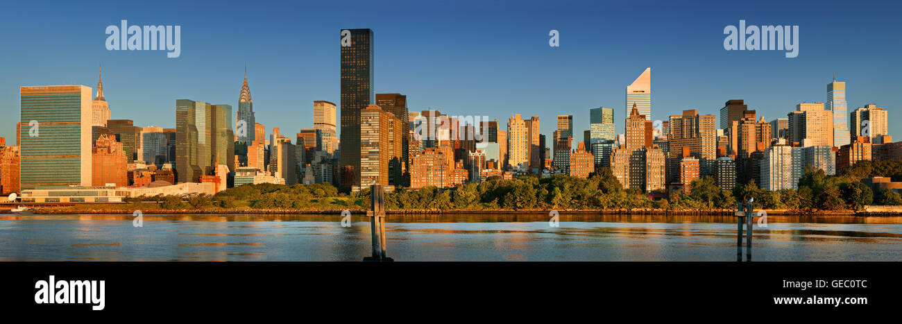 New York City Upper East Side skyscrapers at sunrise with the East ...