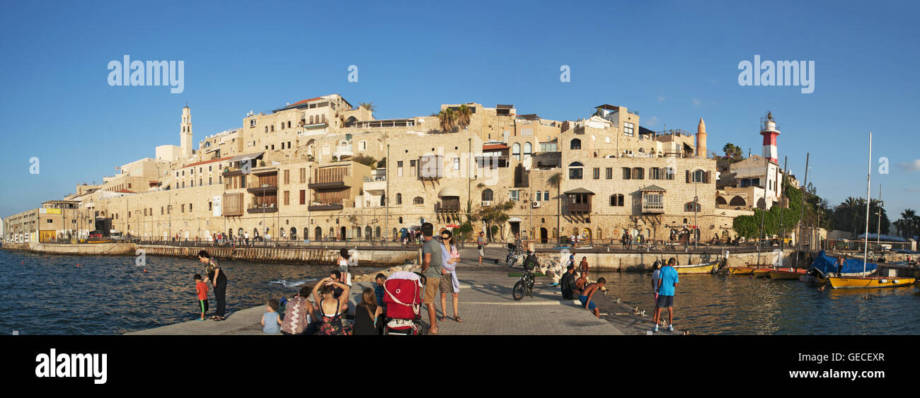 Israel: panoramic view of the Old City of Jaffa and the port at sunset ...