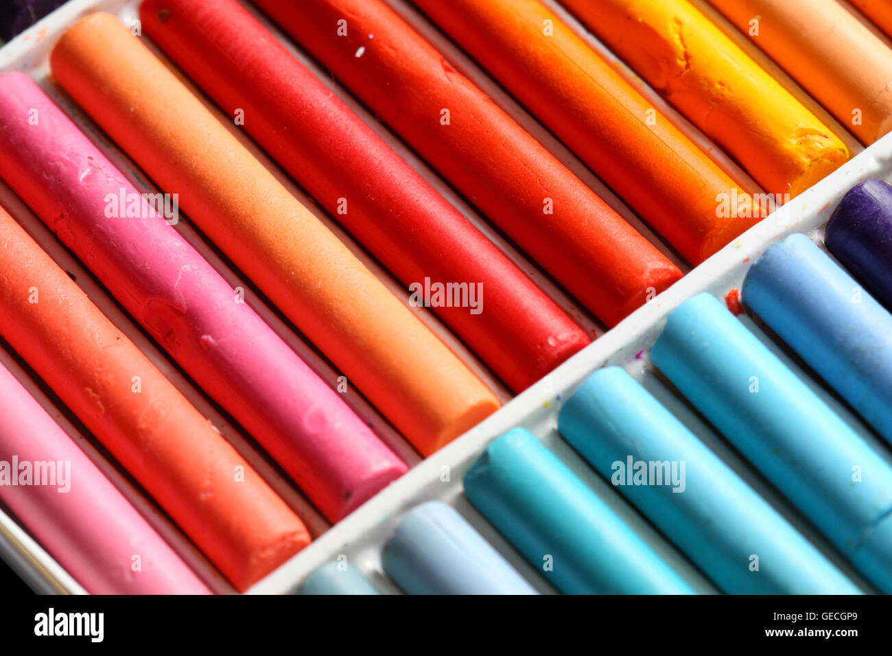 Set of oil pastels in a plastic tray Stock Photo - Alamy