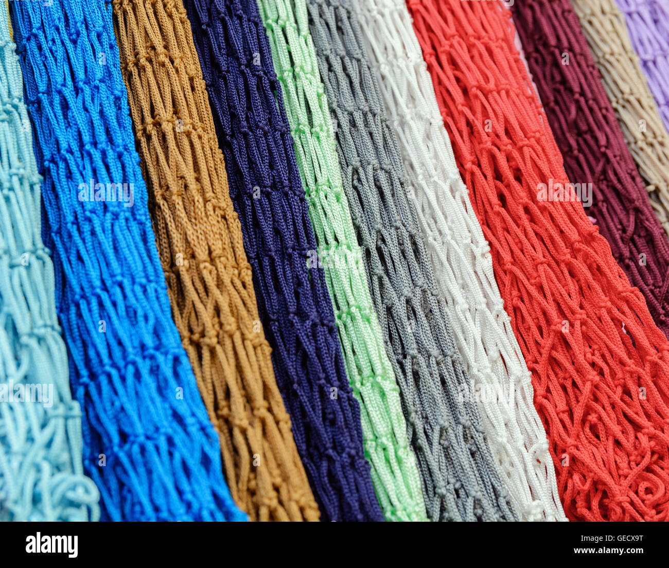 colorful grid of cord hanging vertically in the form multi-colored ...