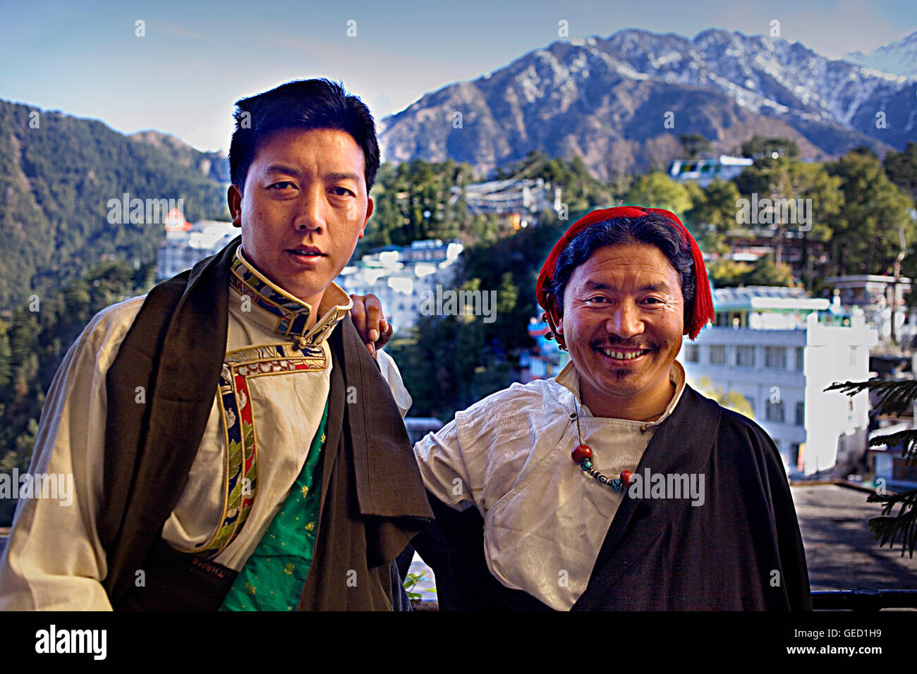 Tibetan men wearing typical dress , in Namgyal Monastery,in ...