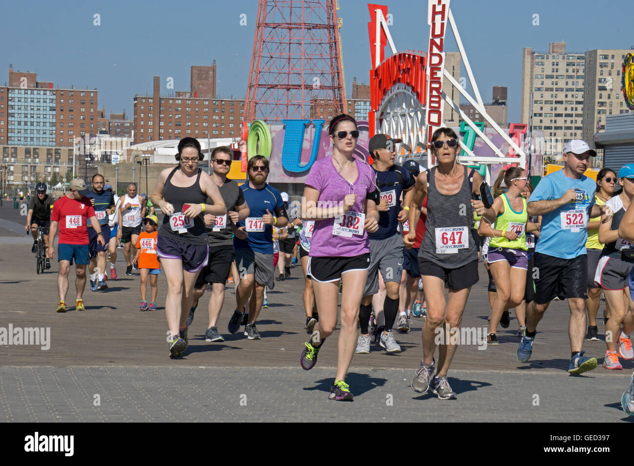 Men and women woman runners & walkers participate in the Brooklyn ...