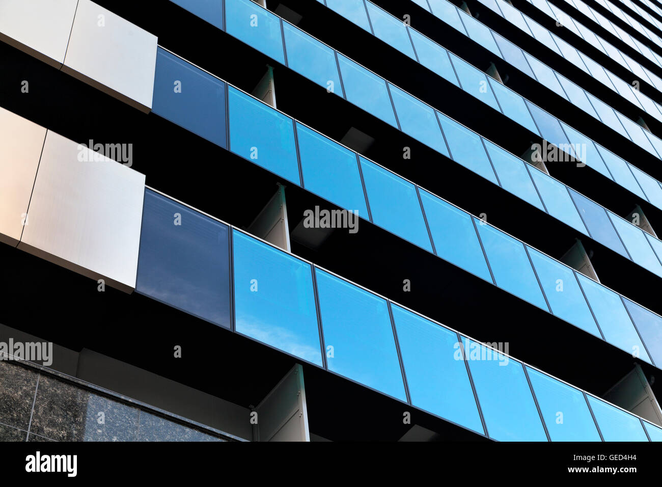 Modern architecture in Tokyo,glass wall background of an office ...