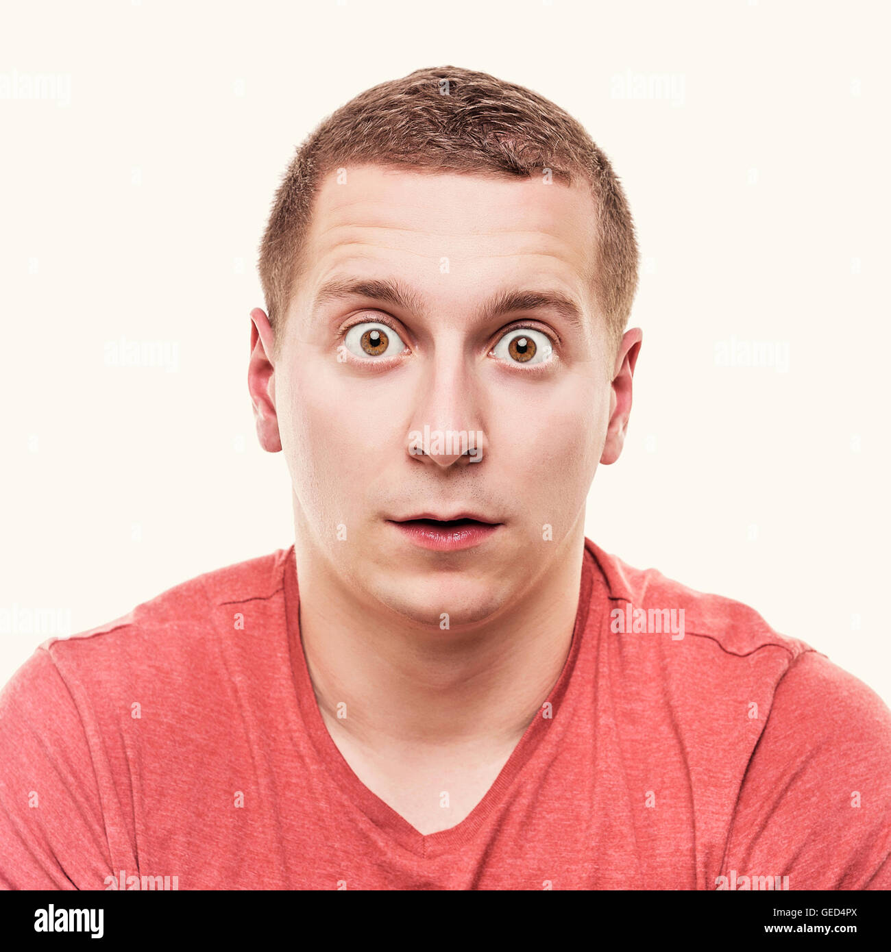 Man is very surprised on white background. Toned photo Stock Photo - Alamy