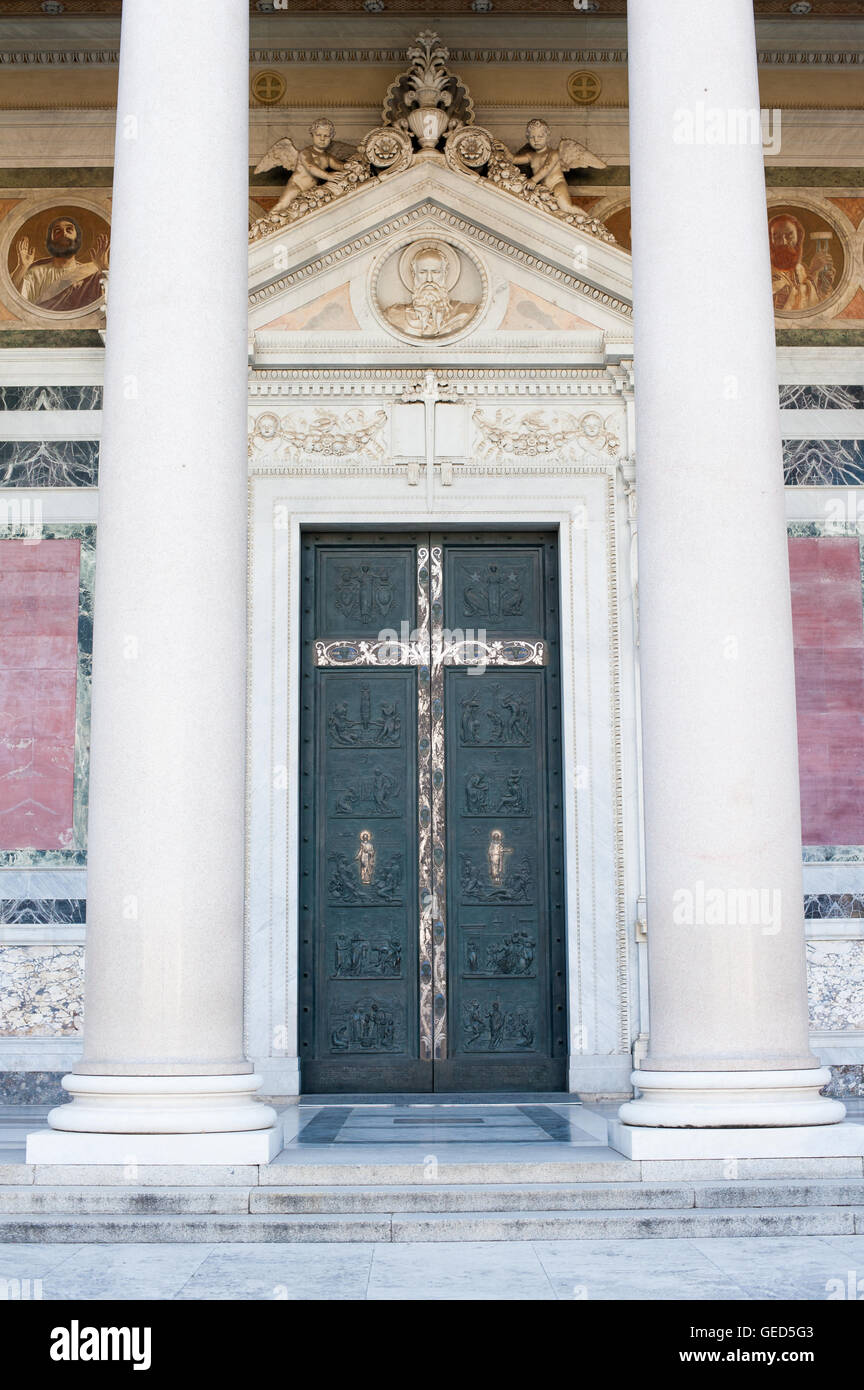St Paul basilica holy door in Rome with column, closed door with big ...