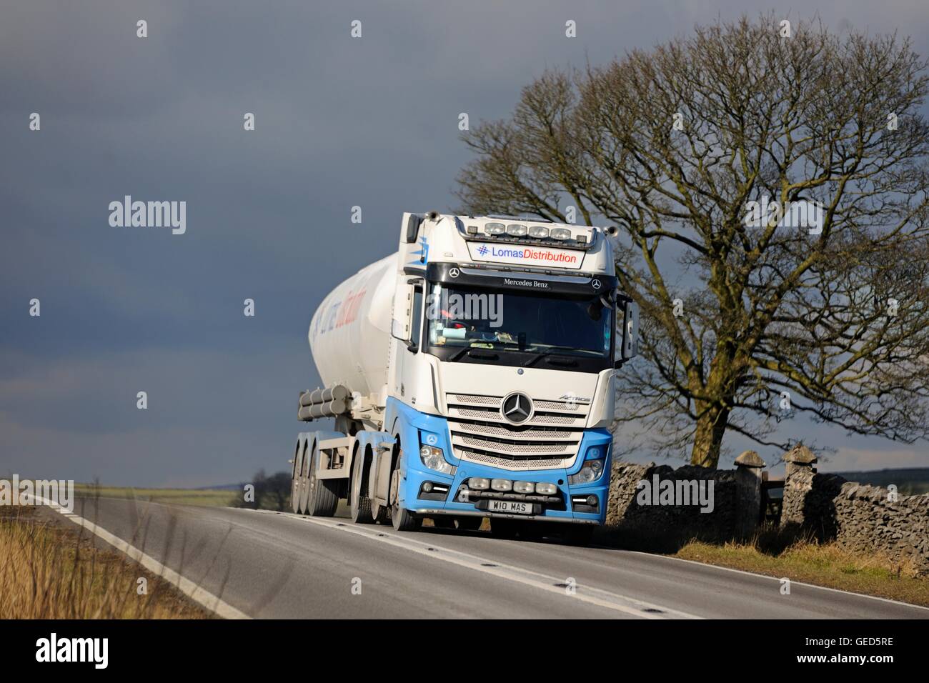 A Lomas Distribution Mercedes Actros tanker HGV rounding a bend on the ...