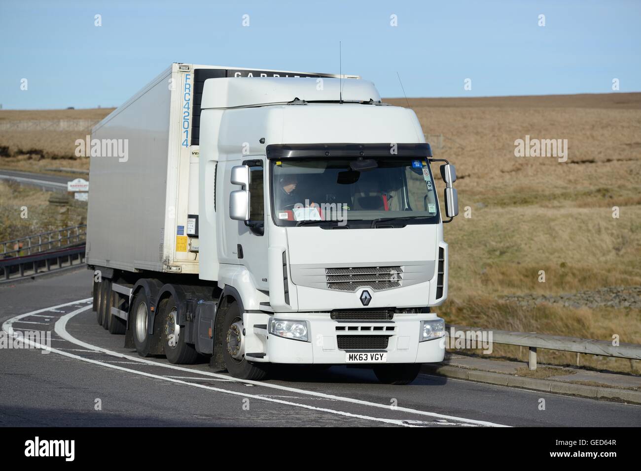 White Renault articulated lorry on the A628 Woodhead Pass Stock Photo ...