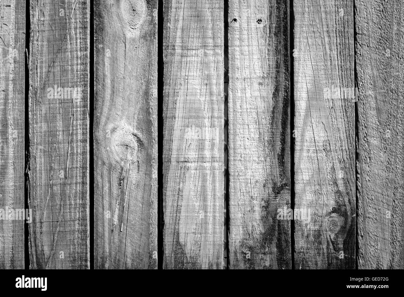 old rough timber fence planks with a old weathered look Stock Photo - Alamy