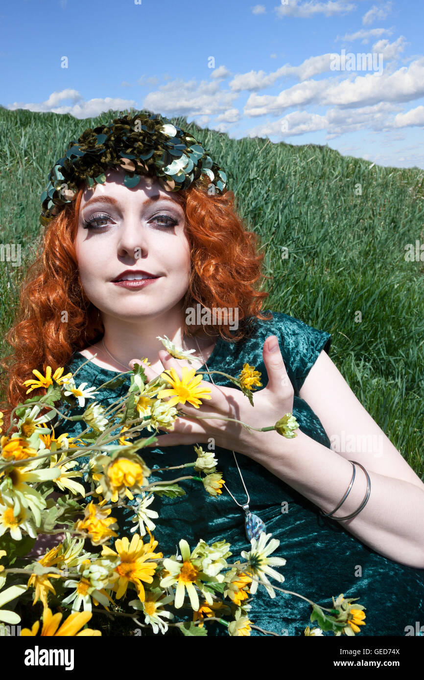 Beautiful Young Woman With Long Curly Red Hair Wearing Green And