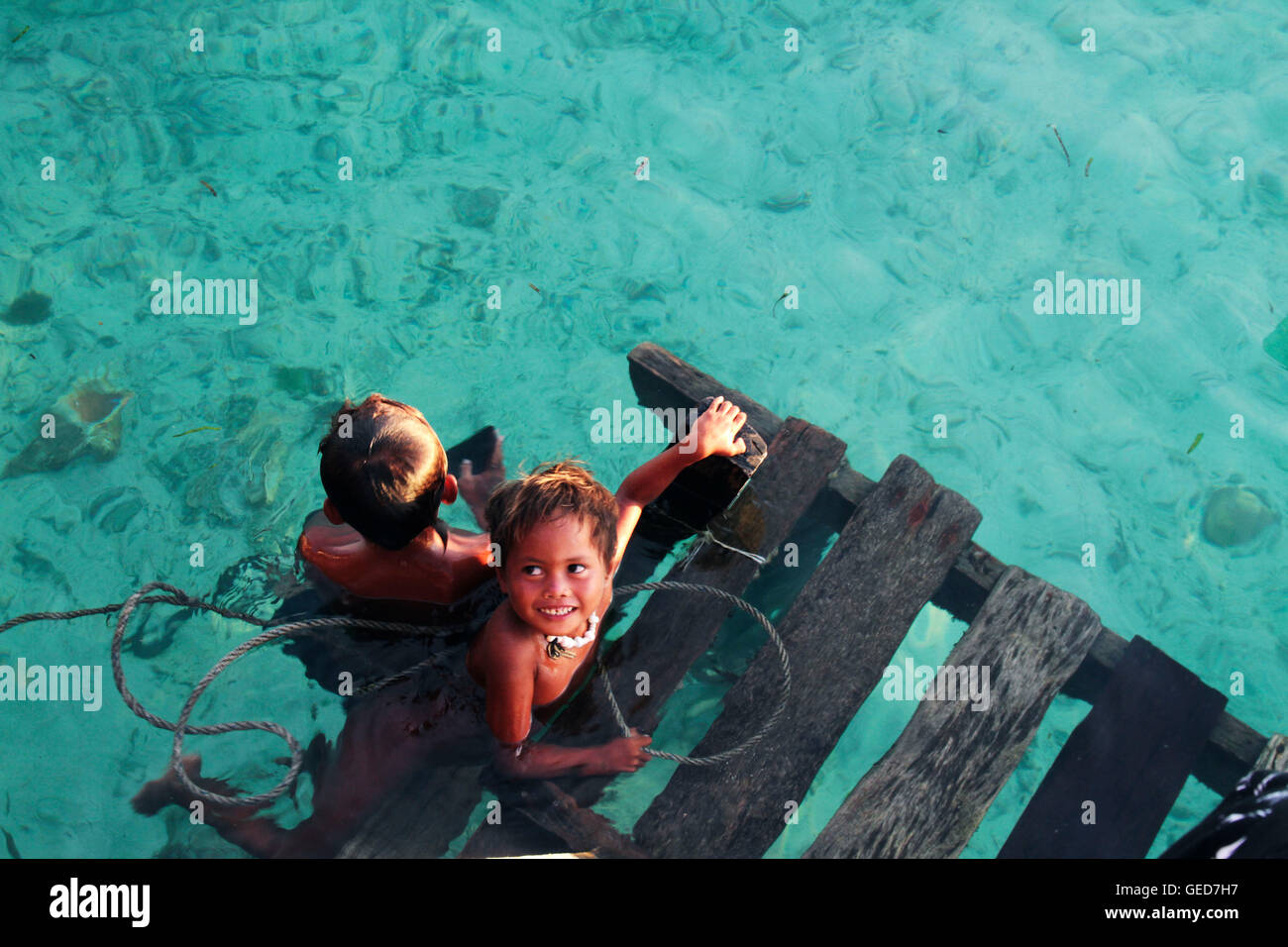 Seafarer Kids in Mabul Island Stock Photo - Alamy