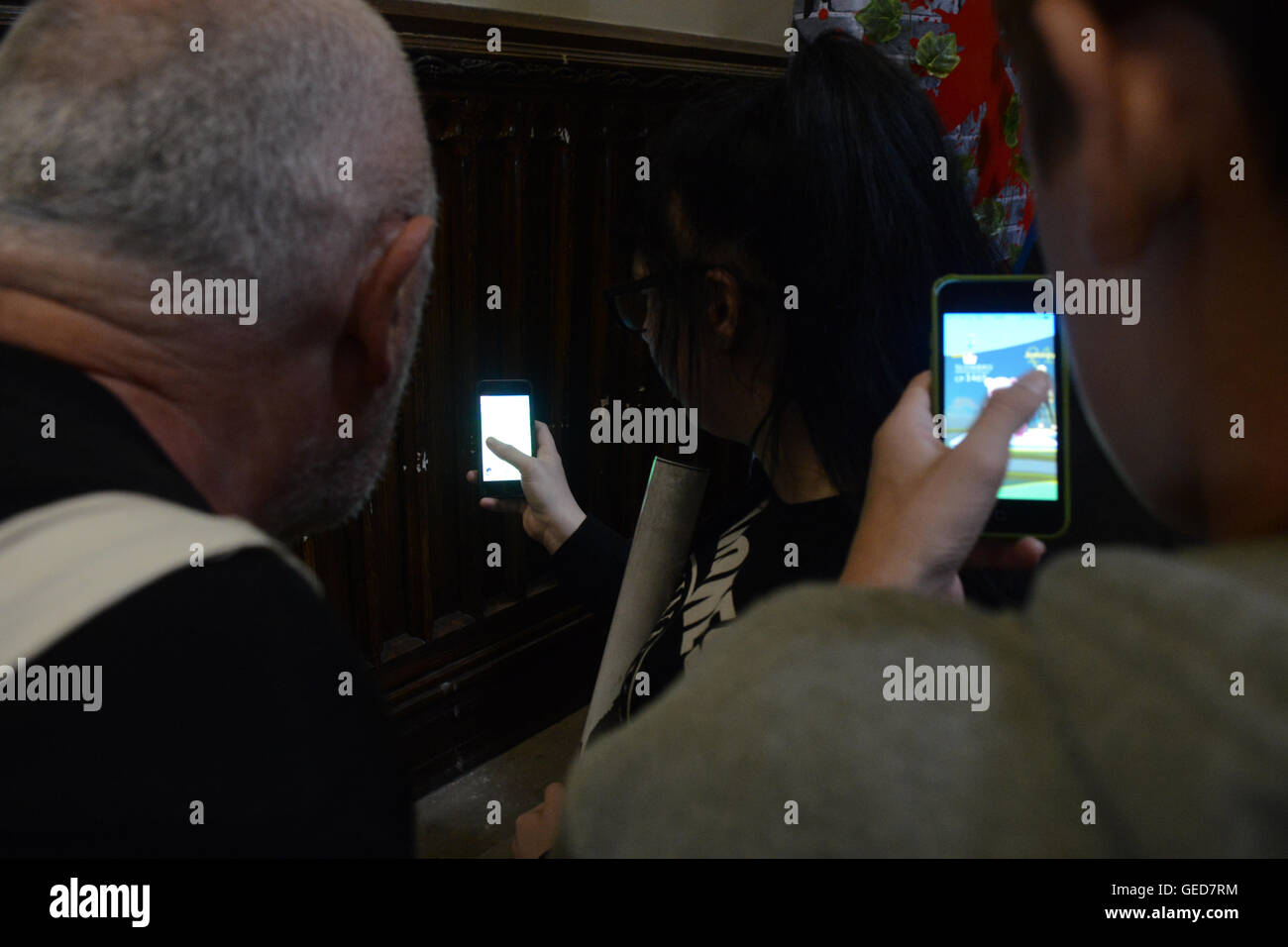 People playing Pokemon Go on their mobile phones Stock Photo - Alamy