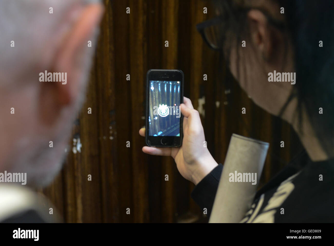 People playing Pokemon Go on their mobile phones Stock Photo - Alamy