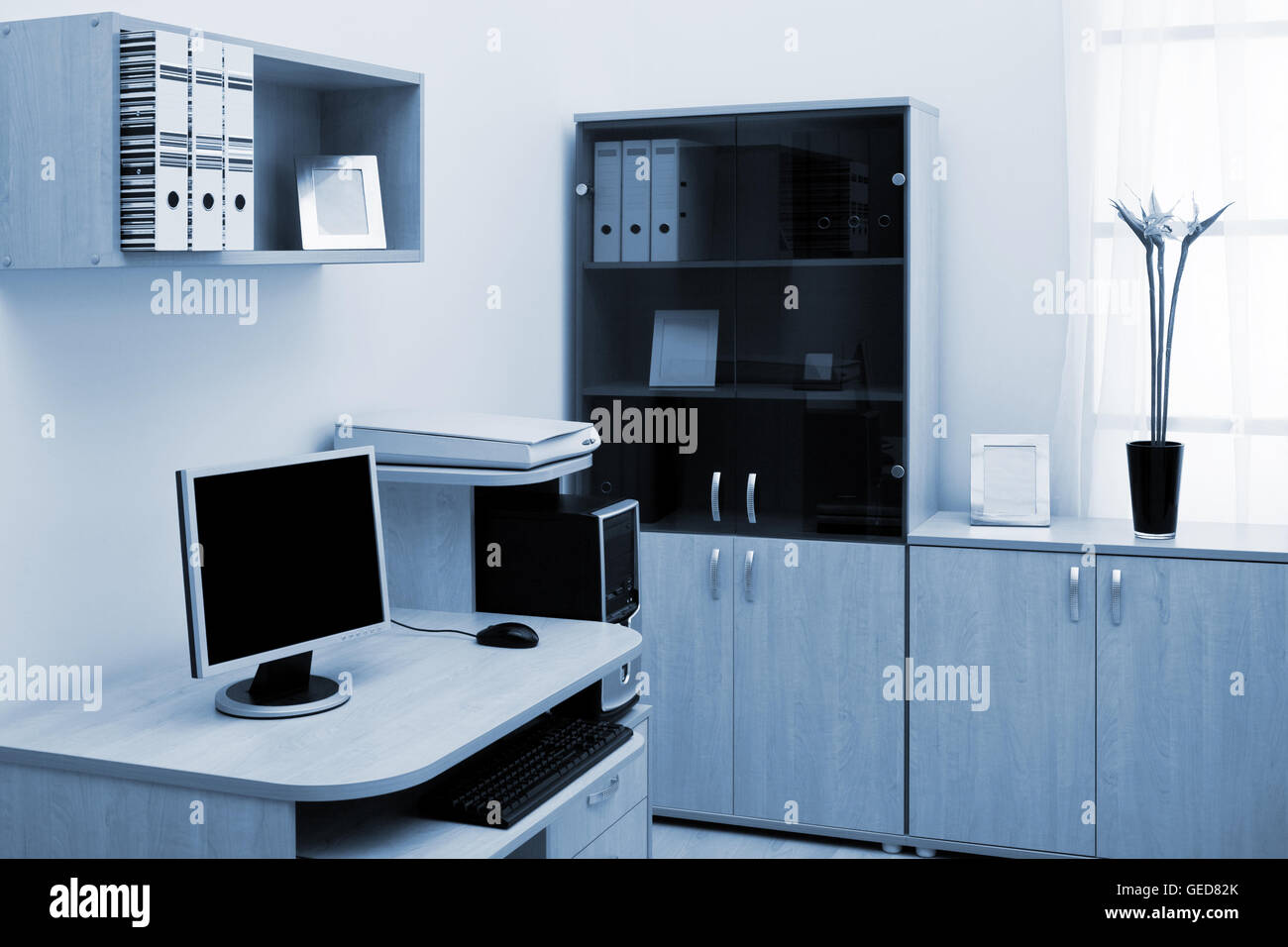 computer on a desk in a modern office Stock Photo - Alamy