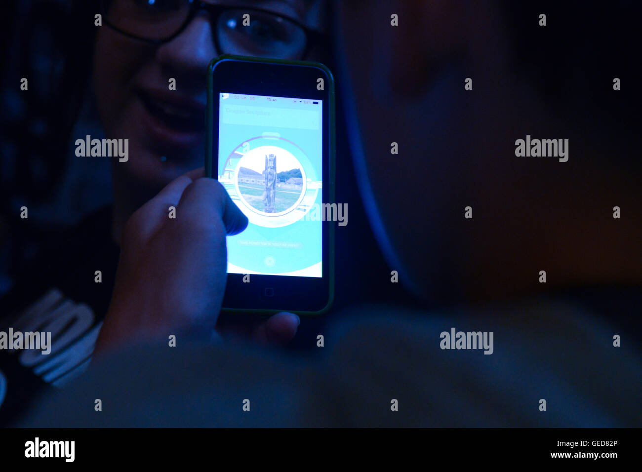 People playing Pokemon Go on their mobile phones Stock Photo - Alamy