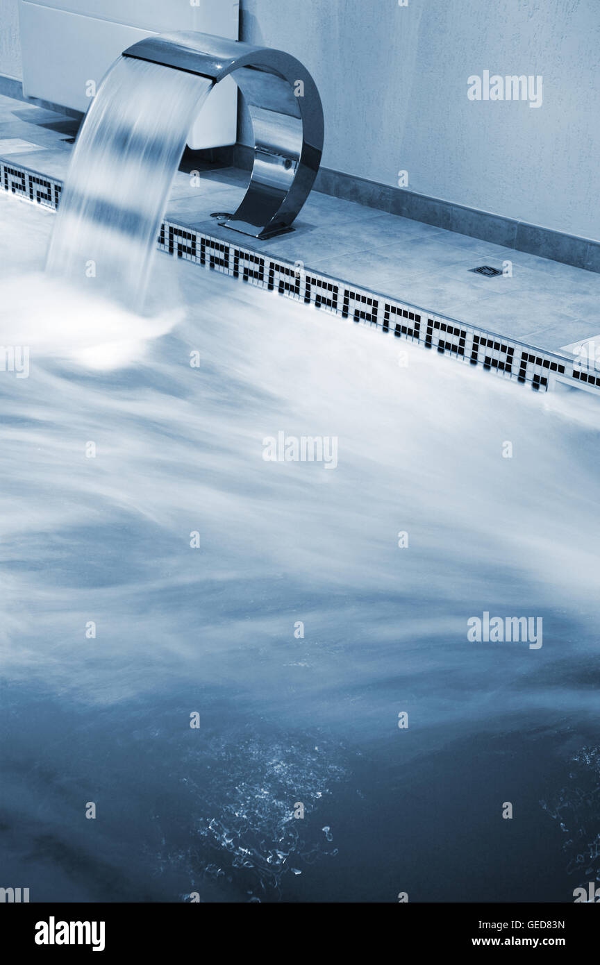 Stream of water current in beautiful pool Stock Photo - Alamy