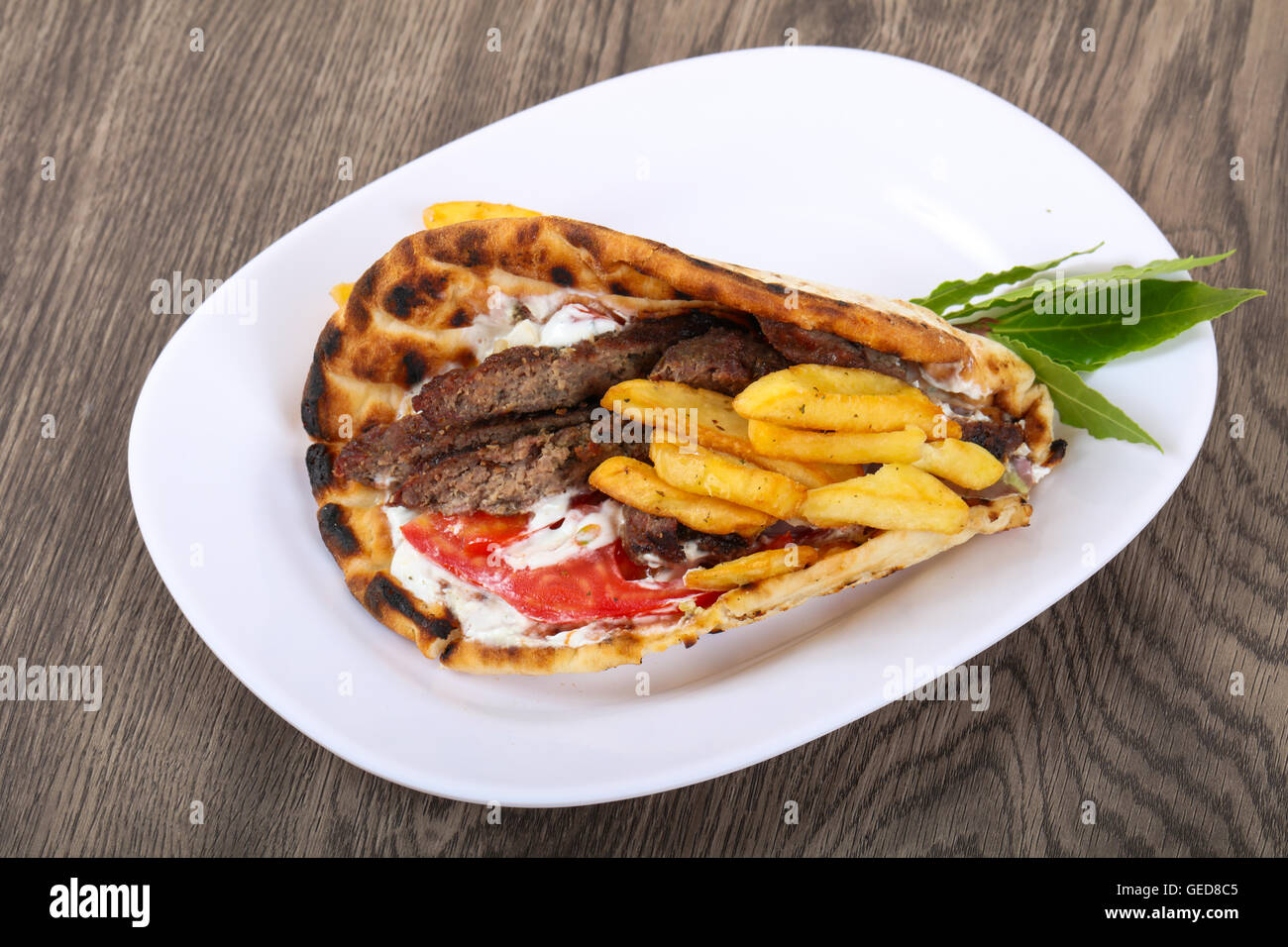 Gyros - tradition Greek cuisine - pork with pita, potato and sauce ...