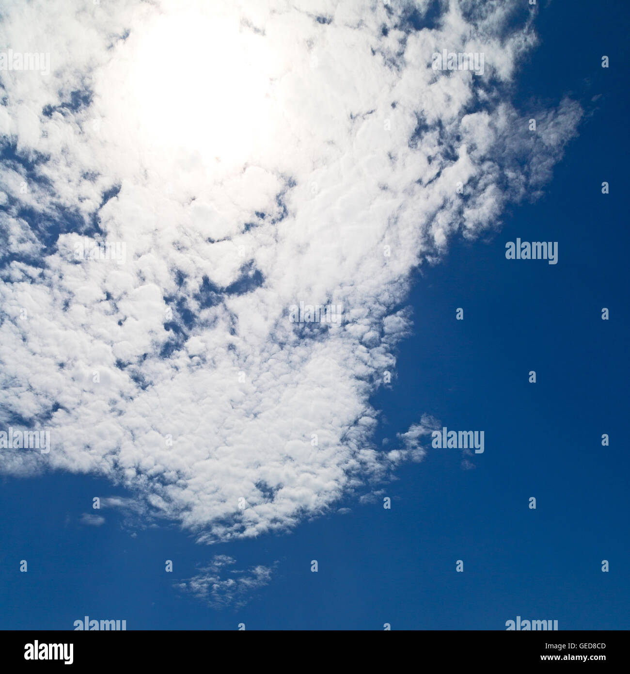 in the cyclades sea of greece sun light and backlight from the clouds ...