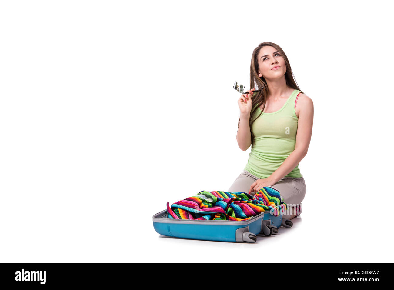 Woman packing preparing for summer vacation isolated on white Stock ...