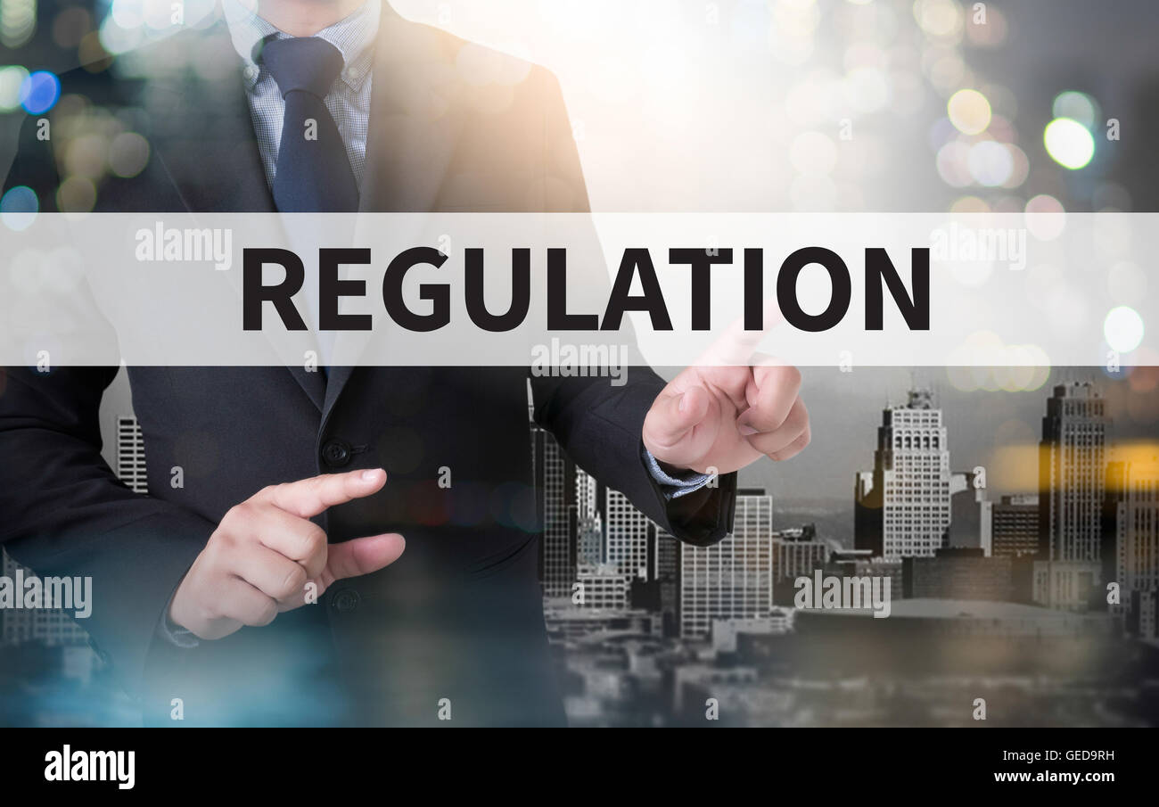 REGULATION and businessman working with modern technology Stock Photo ...