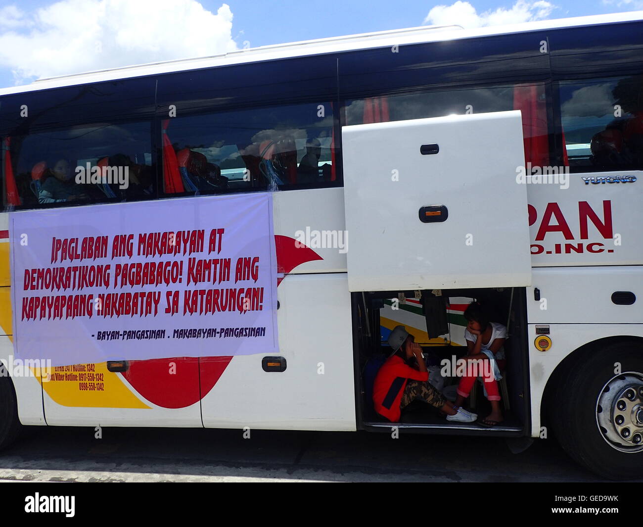Quezon City, Philippines. 25th July, 2016. A bus carrying rallyist with ...