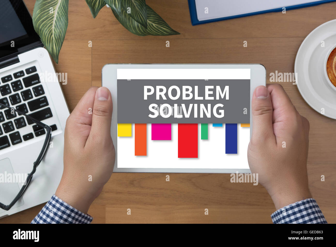 PROBLEM SOLVING man hand Tablet and coffee cup Stock Photo - Alamy