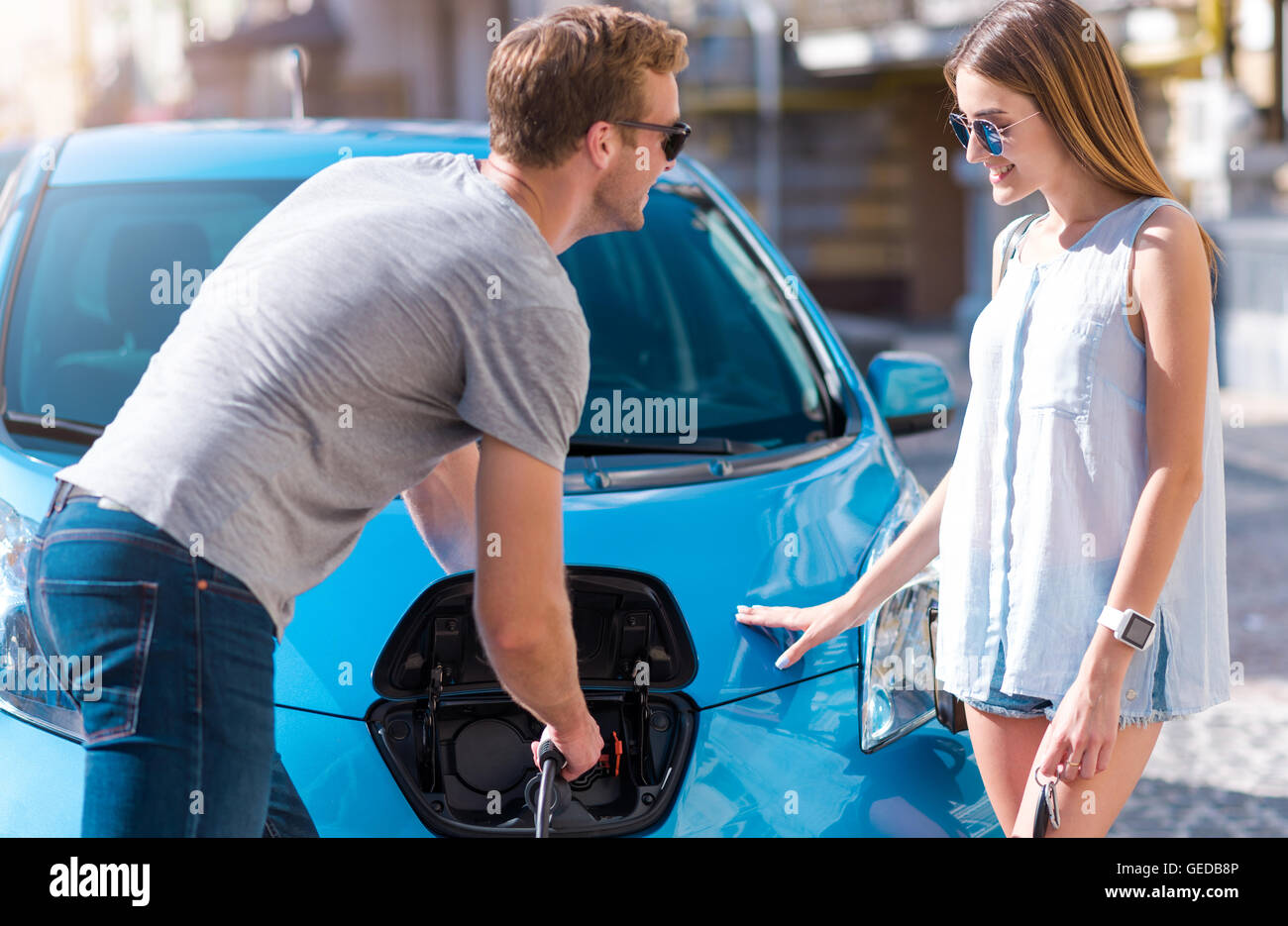 Beautiful woman electric car hi-res stock photography and images - Alamy