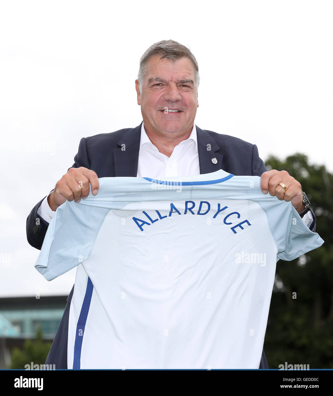 England manager Sam Allardyce poses for a photograph with an England ...