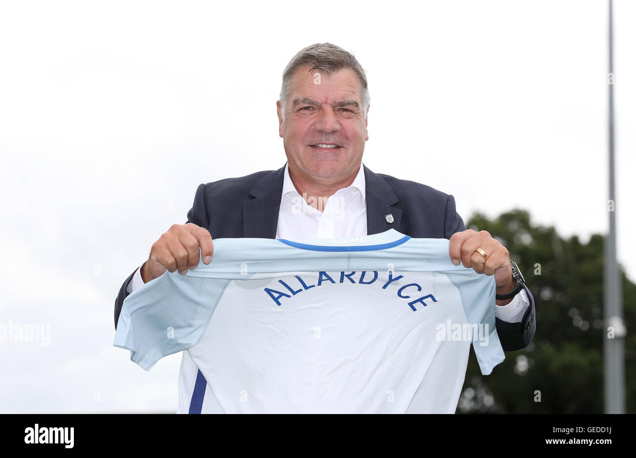 England manager Sam Allardyce poses for a photograph with an England ...