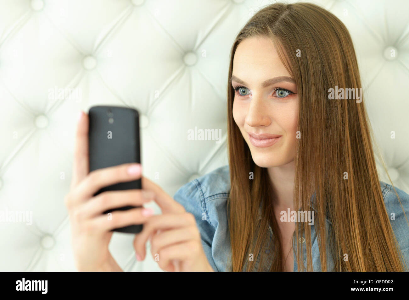 Pretty girl taking selfie Stock Photo - Alamy