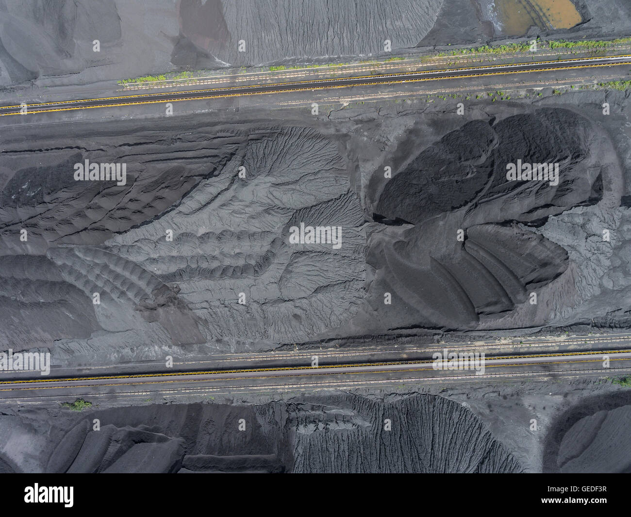 Mining excavator on the bottom surface mine. Brown coal deposits. View ...