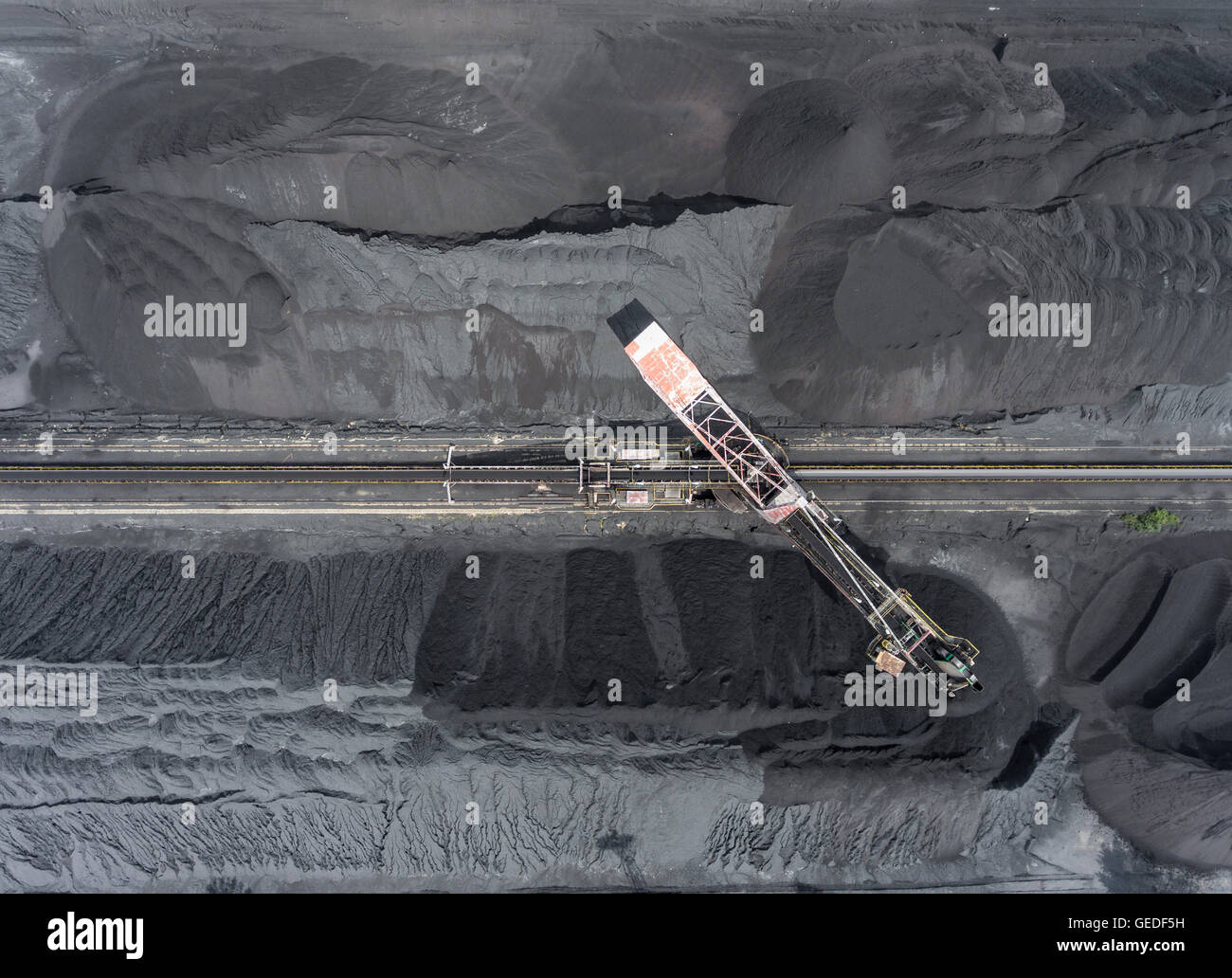 Mining excavator on the bottom surface mine. Brown coal deposits. View ...
