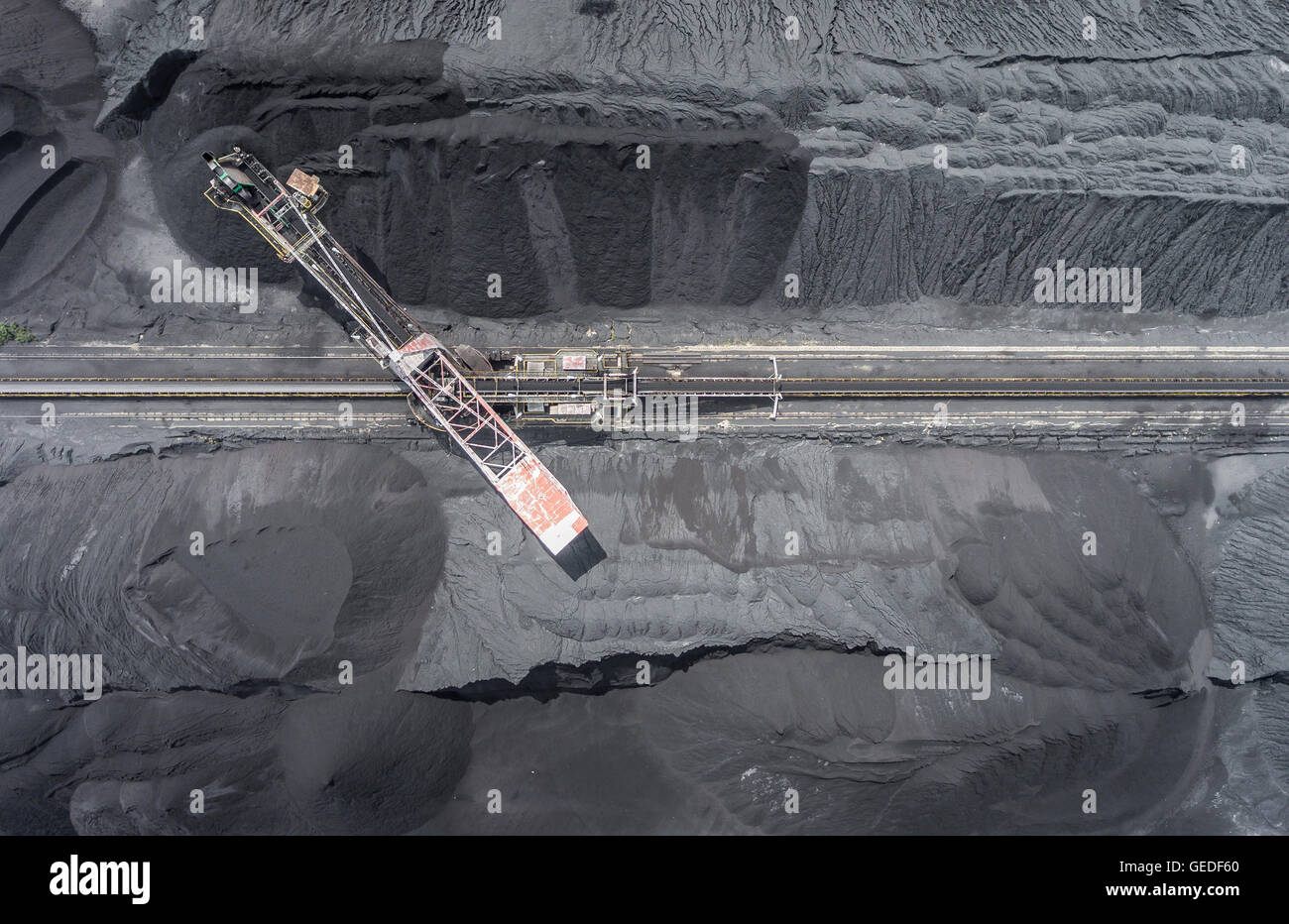 Mining excavator on the bottom surface mine. Brown coal deposits. View ...